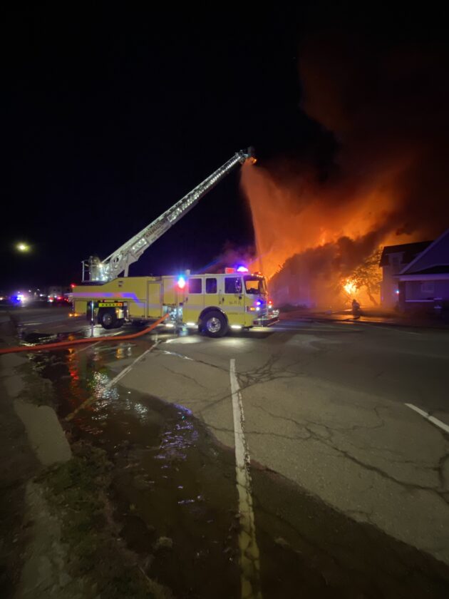Firefighters, officers respond to house fire that spread to The Depot ...